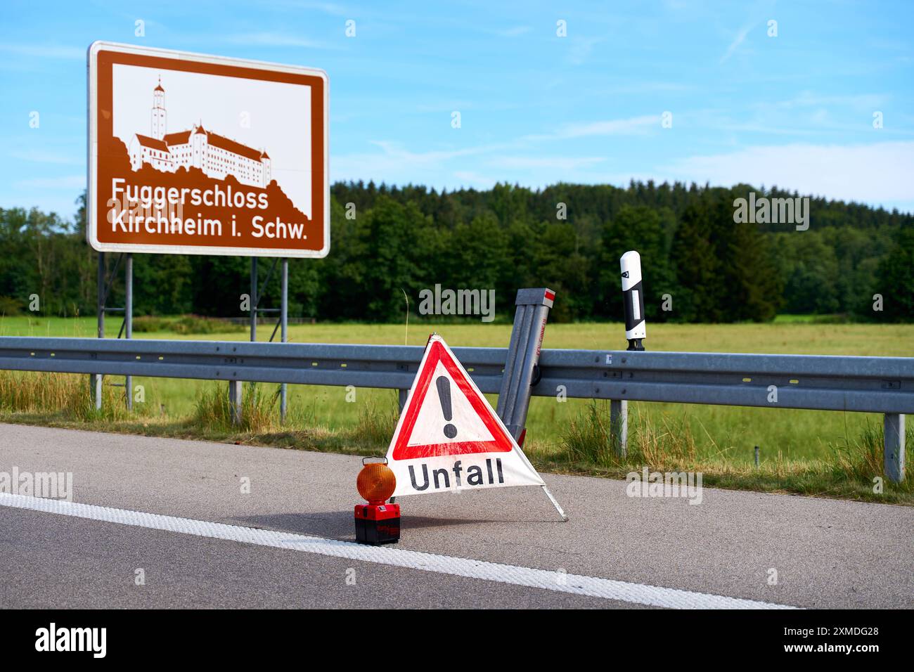 Autobahn A96, Bavaria, Germany - 26 July 2024: A warning triangle with ...