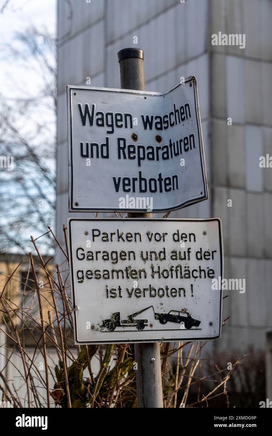 Garage courtyard of a residential building, signs indicating the ban on ...