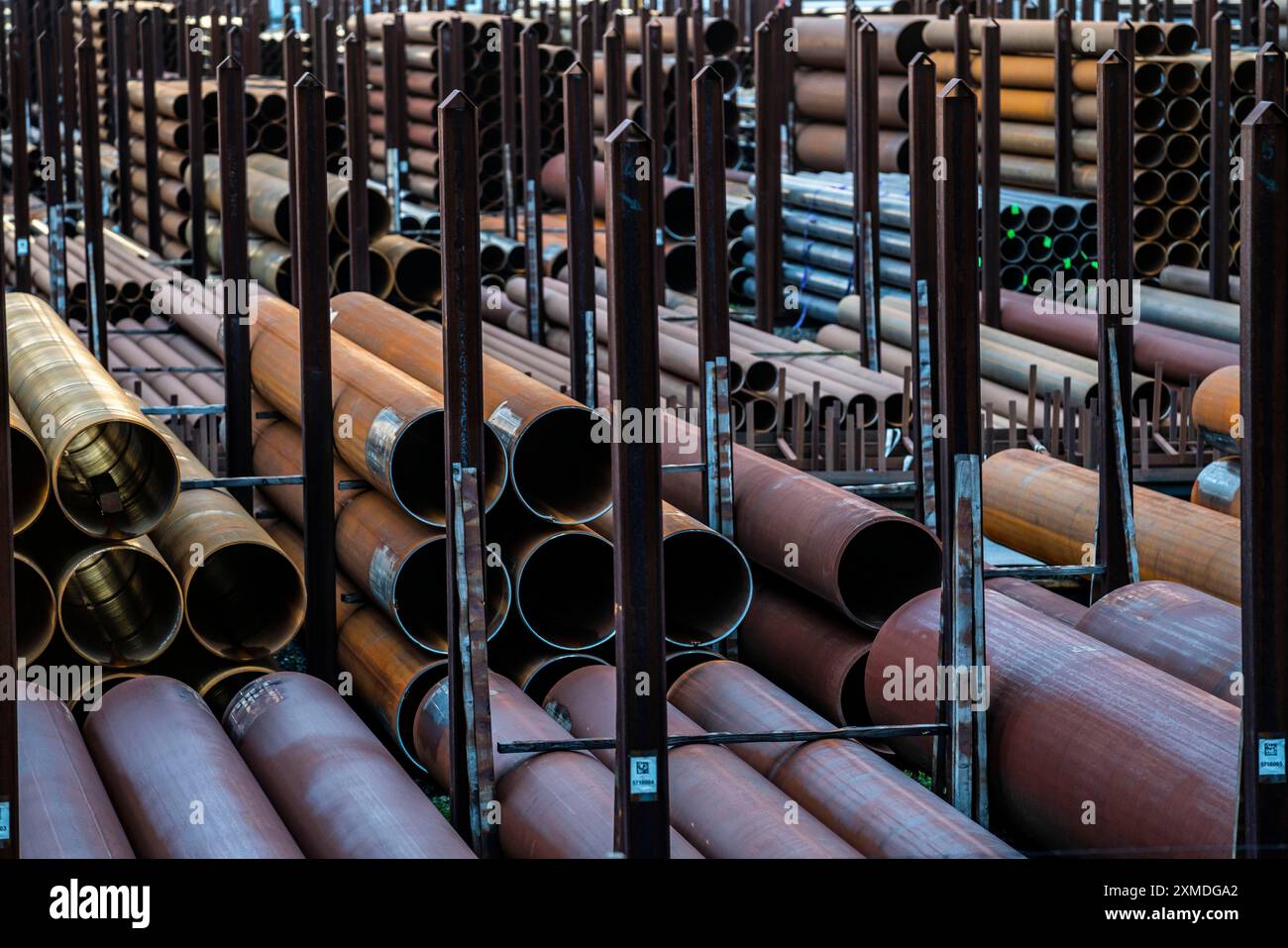 Warehouse for steel pipes in Duisburg harbour, steel pipes in various ...