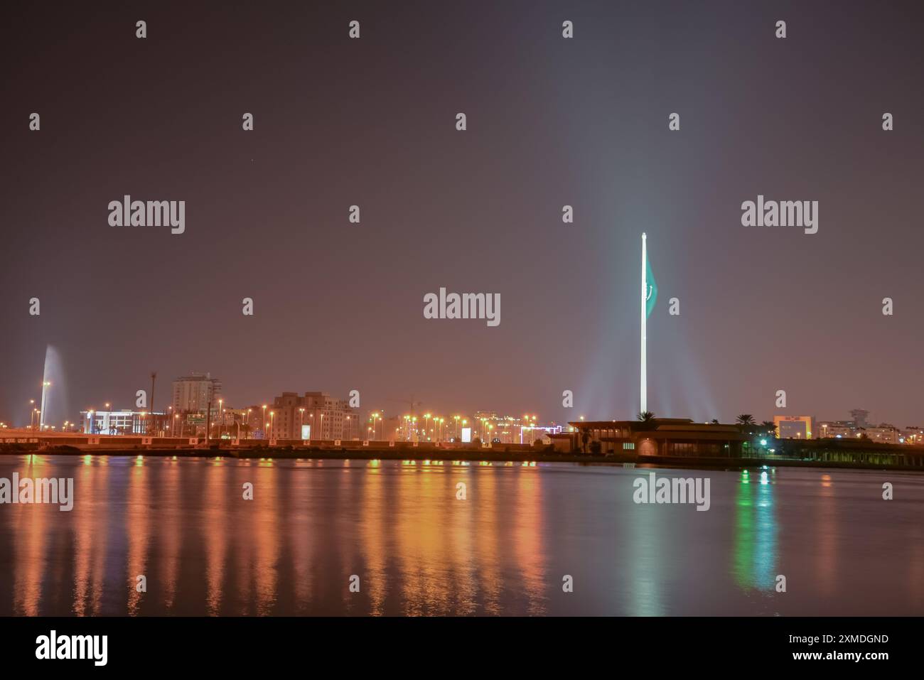 Night View of Jeddah Ruwais Area Featuring Jeddah Flagpole and Water ...