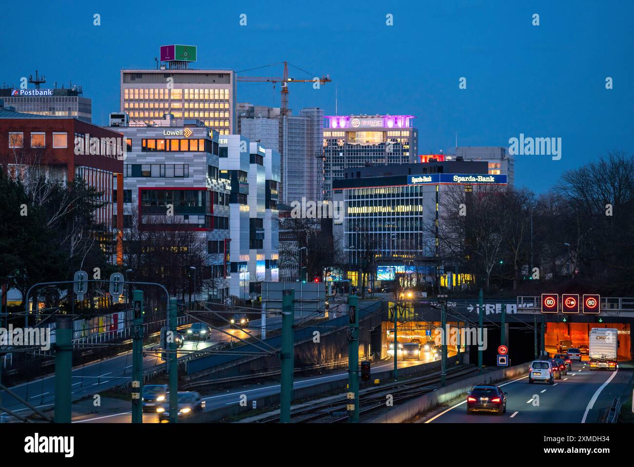 The skyline of Essen city centre, A40 motorway, Ruhrschnellweg tunnel ...