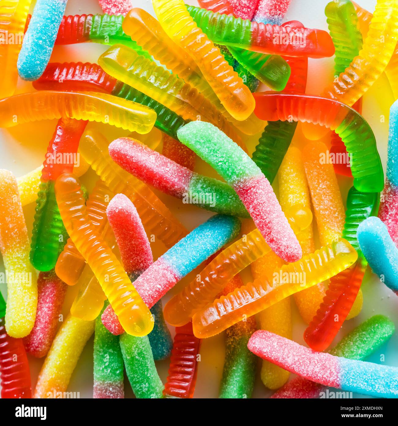 Neon gummy worms hi-res stock photography and images - Alamy