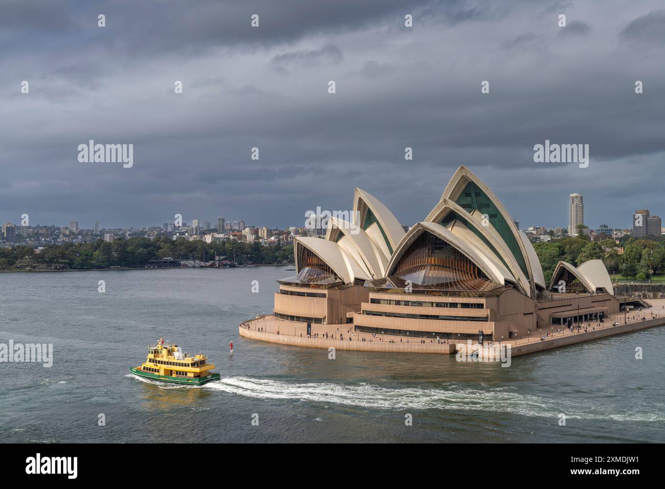 The Opera House and office towers in the harbour of Sydney, Australis ...