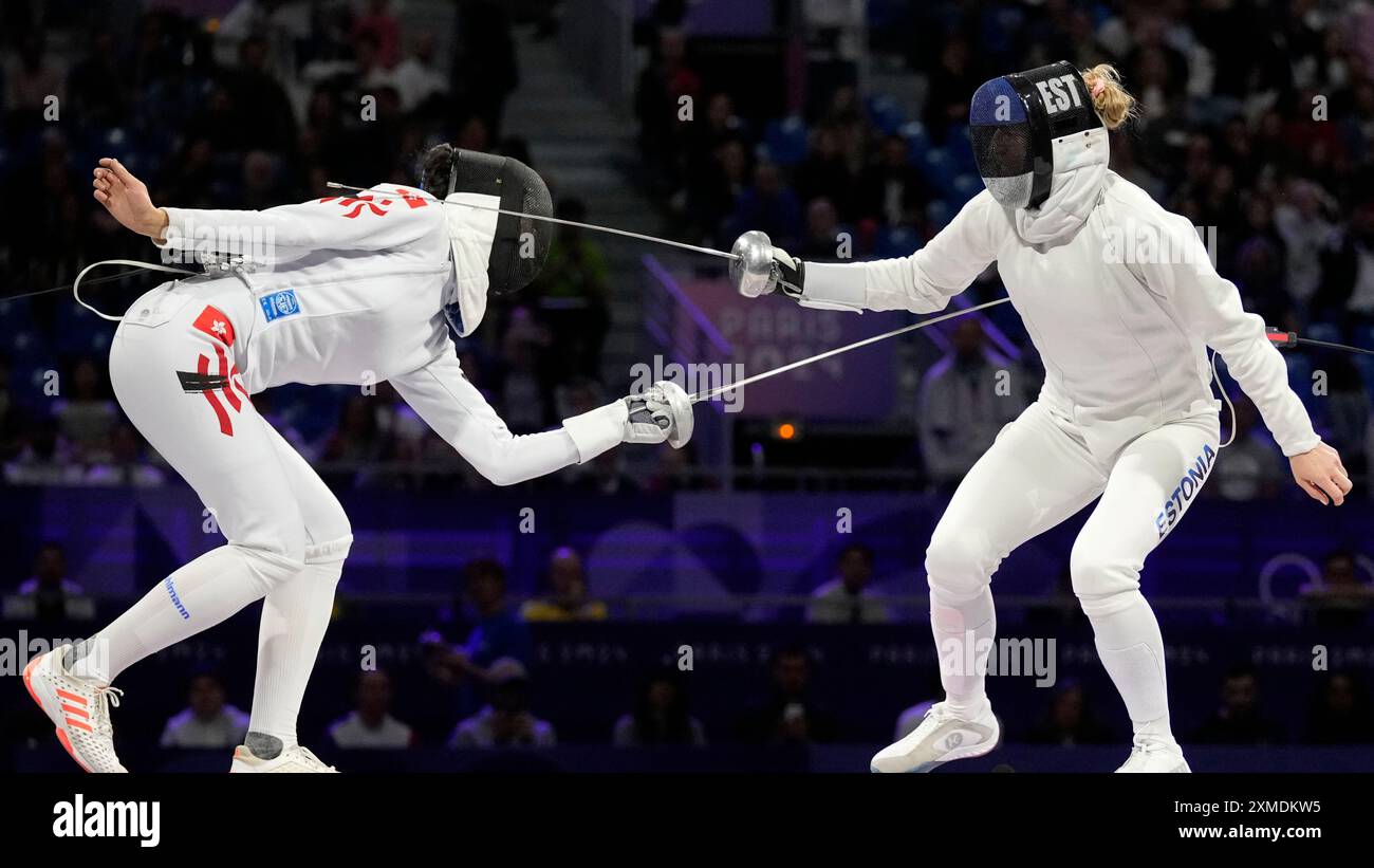 Hong Kong's Kong Man Wai Vivian, left, and Estonia's Nelli Differt ...