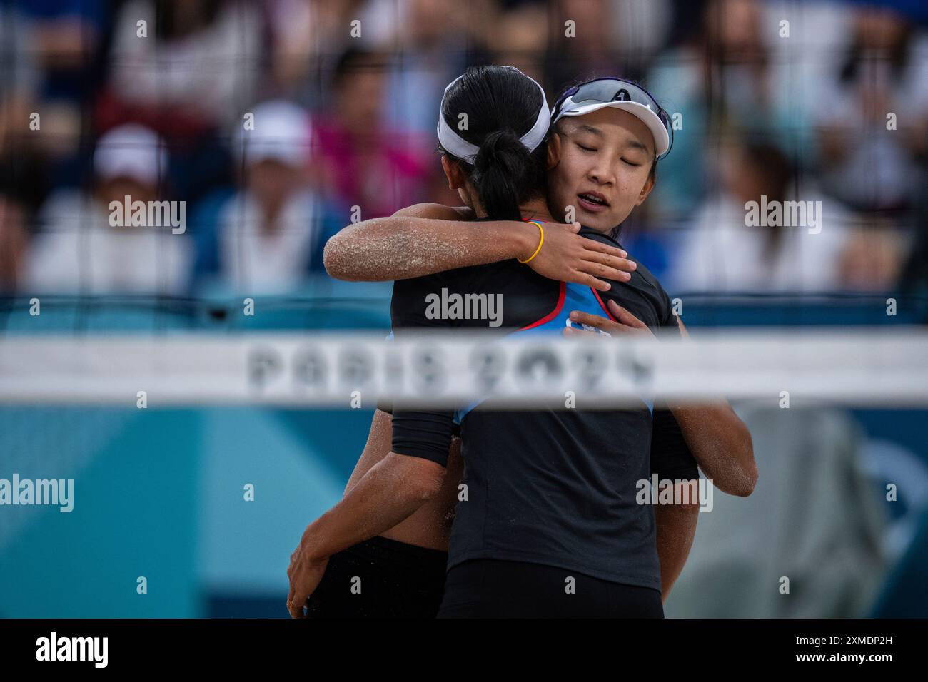 China's Xia Xinyi reacts during the women's pool B beach volleyball ...
