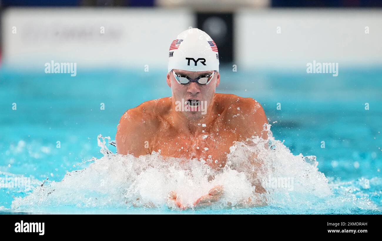 Nic Fink, of the the United States, competes during a heat in the men's ...
