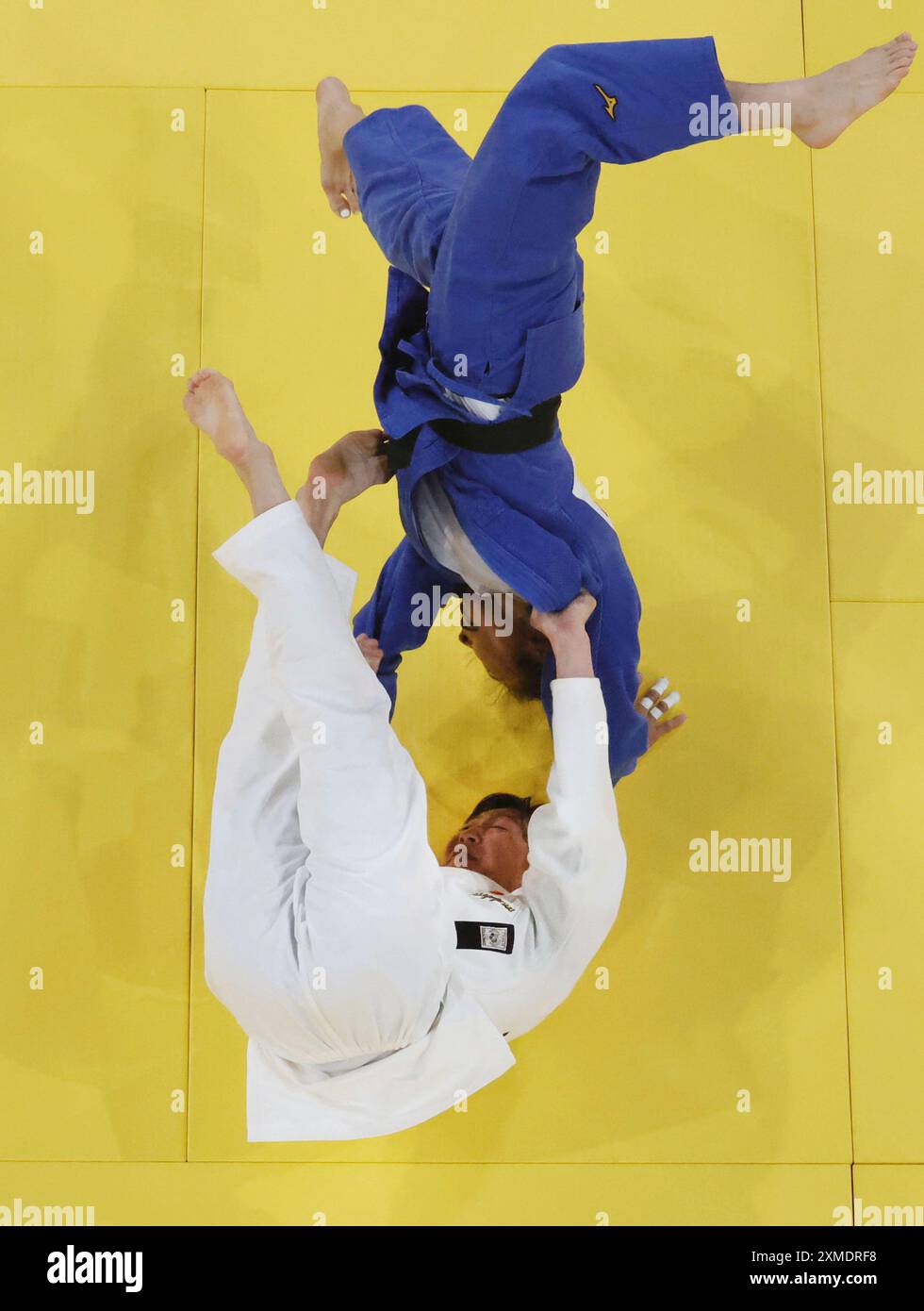 TSUNODA Natsumi of Japan (white) competes in the women's judo gold ...