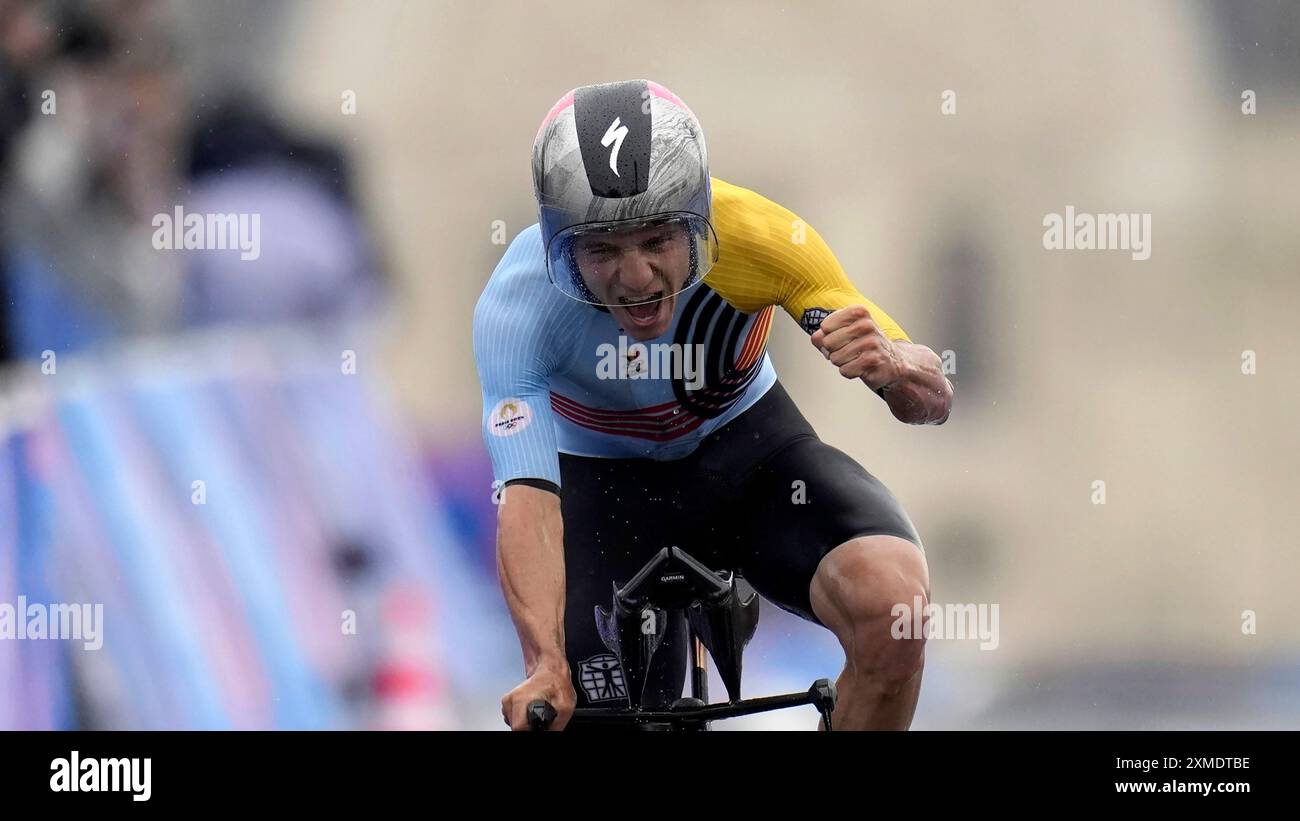 Remco Evenepoel, of Belgium, wins the men's cycling time trial event ...