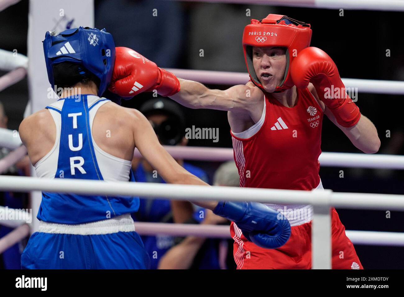 Britain's Charley Davison hits Turkey's Hatice Akbas in their women's ...