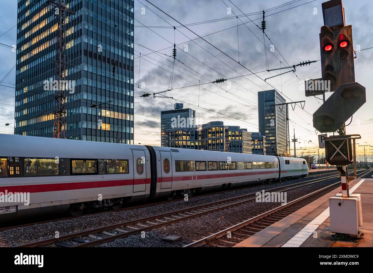 Railway station, ICE train on platform, skyline of Essen city centre ...