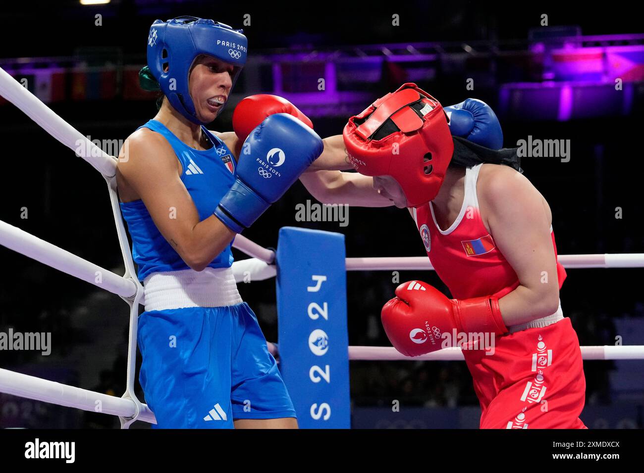 Mongolia's Enkhjargal Munguntsetseg, right, fights Italy's Sirine ...
