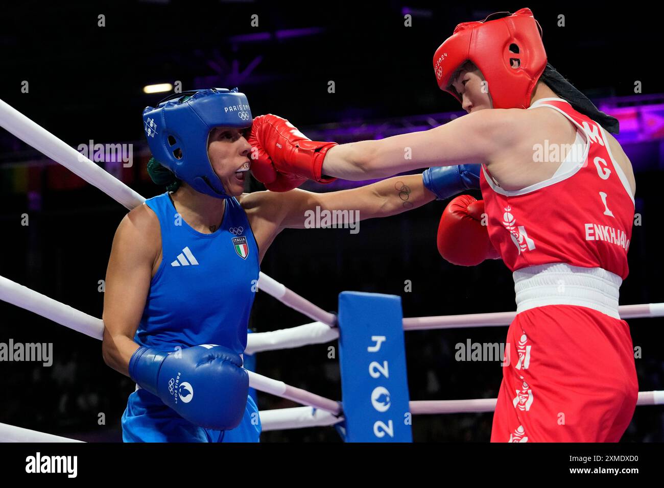 Mongolia's Enkhjargal Munguntsetseg, right, fights Italy's Sirine ...