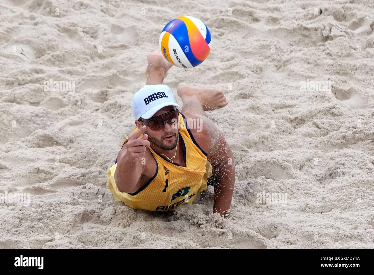 Brazil's George Souto Maior Wanderley dives to keep the ball alive in a ...