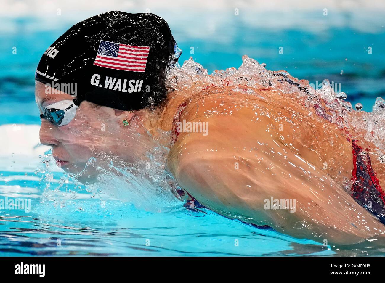 Gretchen Walsh, of the United States, competes in the women's 100-meter ...