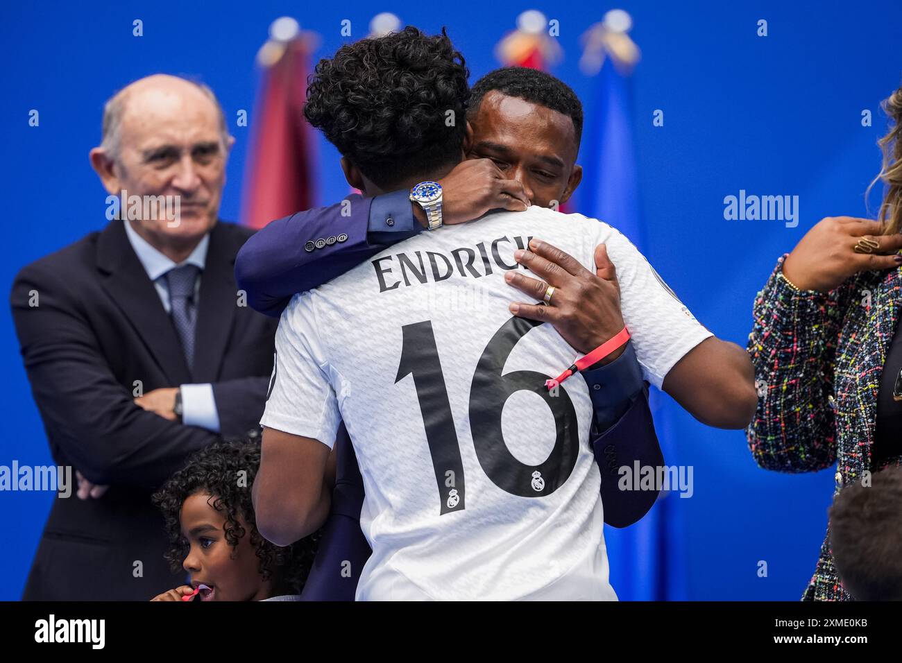 Endrick Felipe Moreira de Sousa (R) hugs his father Douglas de Sousa (L ...