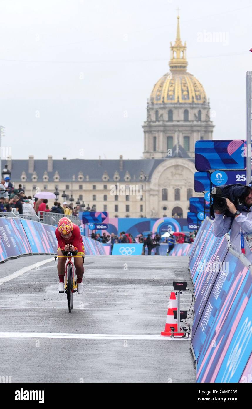 Paris, France. 27th July, 2024. Tang Xin of China cycles to cross the ...