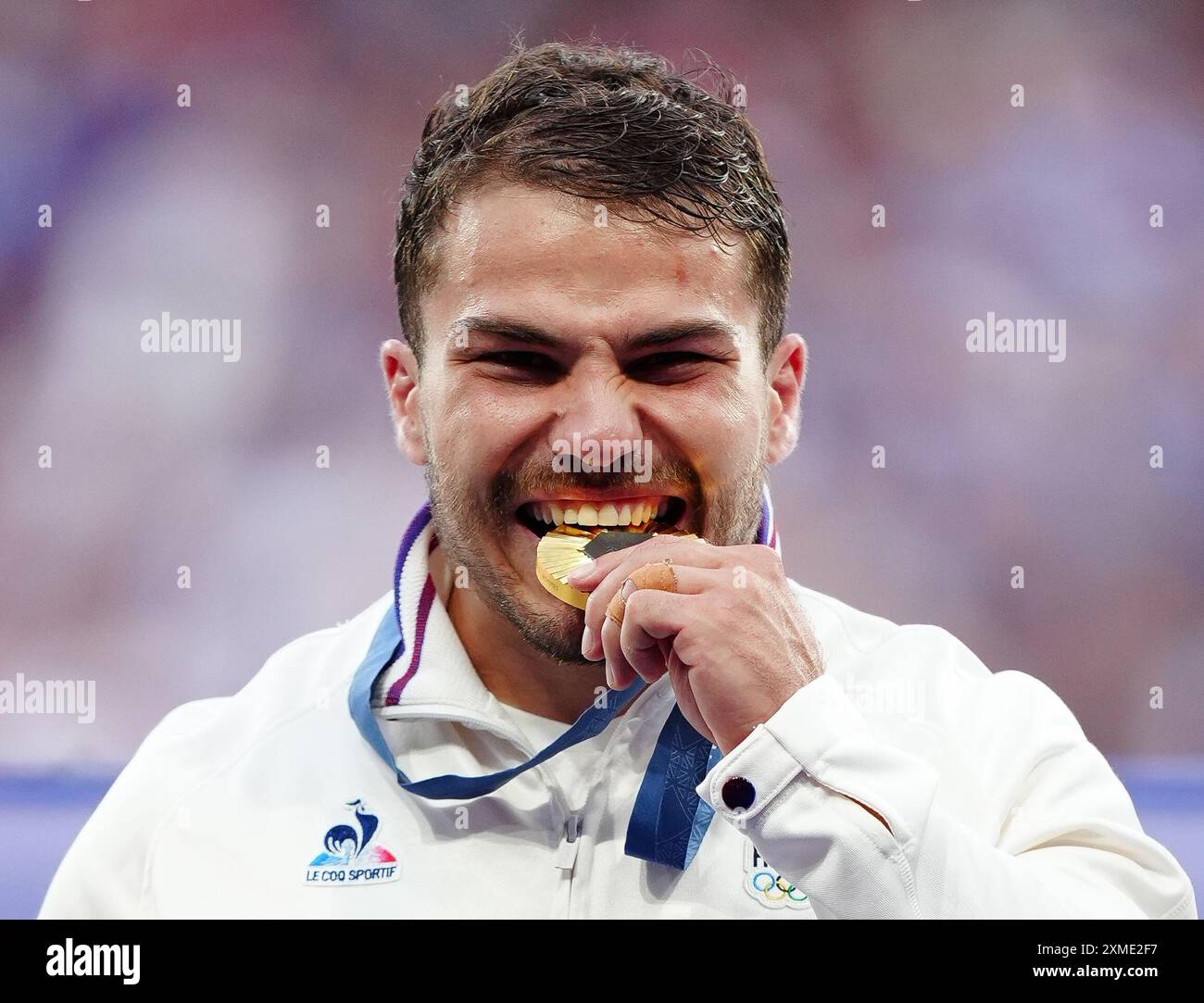 France's Antoine Dupont celebrates winning gold after the rugby sevens ...
