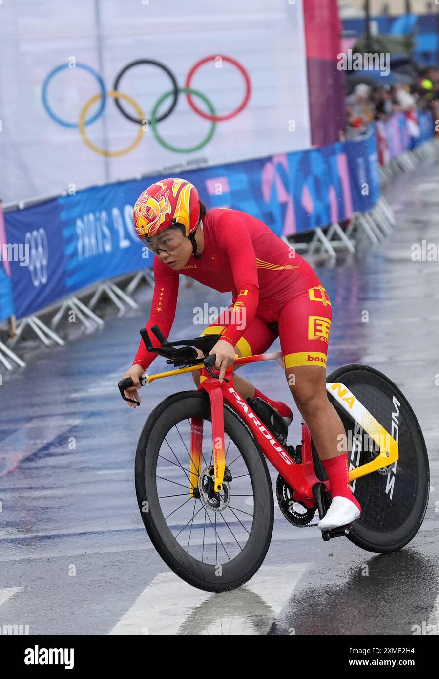 Paris, France. 27th July, 2024. Tang Xin of China cycles at the start ...