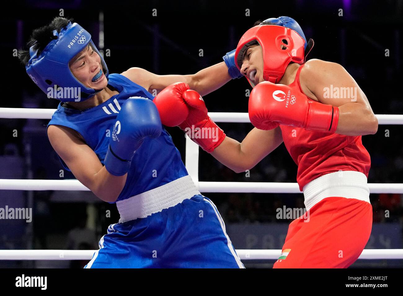 India's Preeti, right, fights Vietnam's Vo Thi Kim Anh in their women's ...