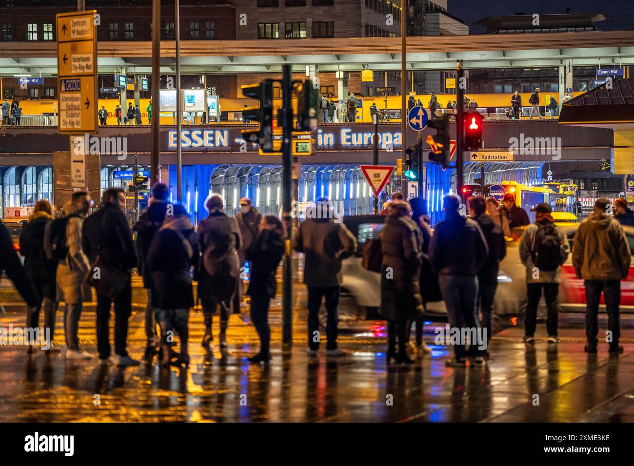 Pedestrian, in rainy weather, at a traffic light, pedestrian crossing ...