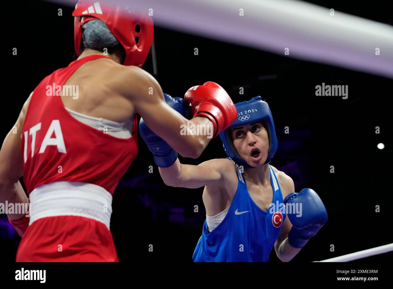 Italy's Alessia Mesiano, left, fights Turkey's Gizem Ozer in their ...
