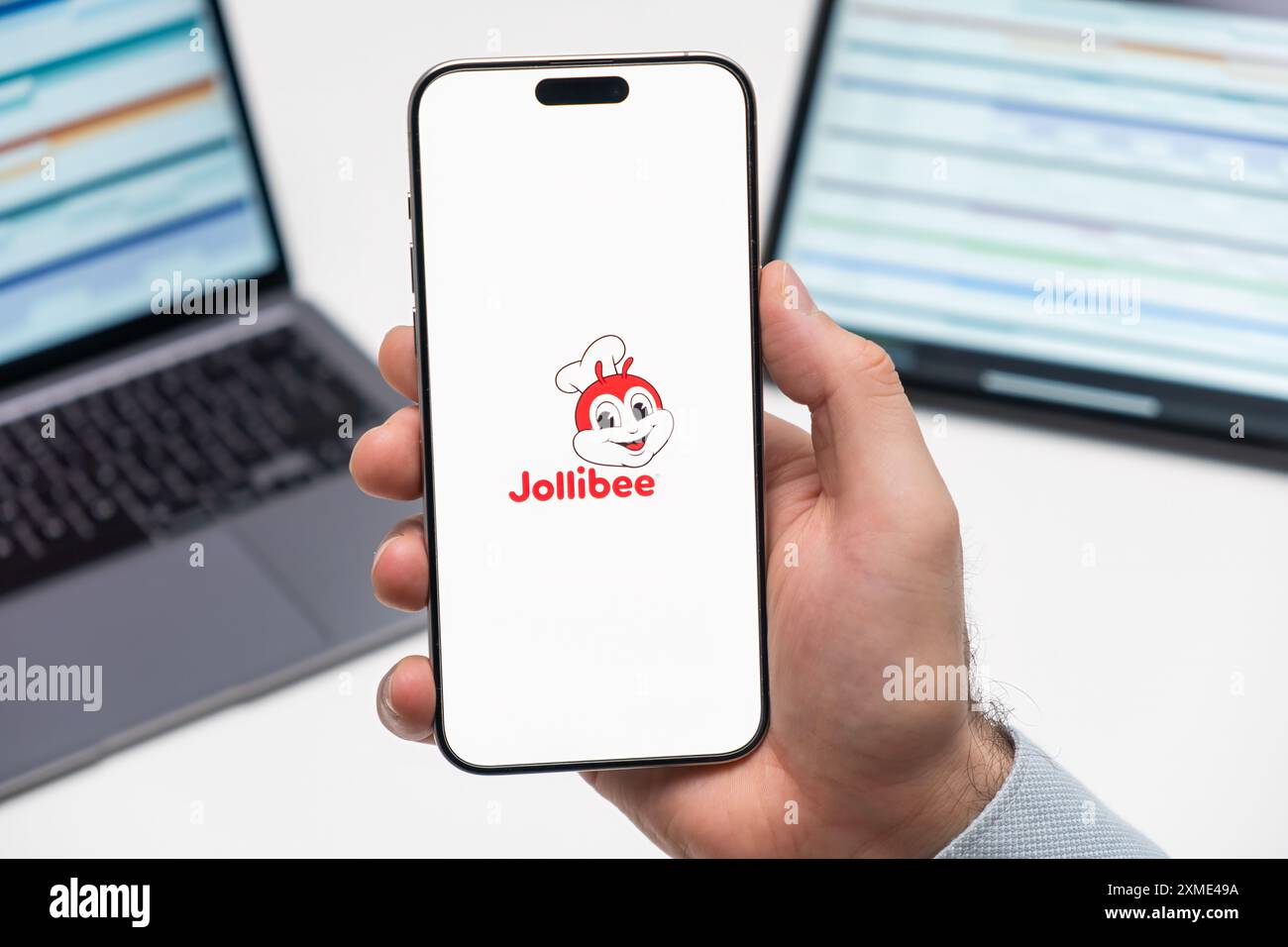 PRAGUE, CZECHIA - JULY, 2024: Jollibee logo on the screen of smartphone ...