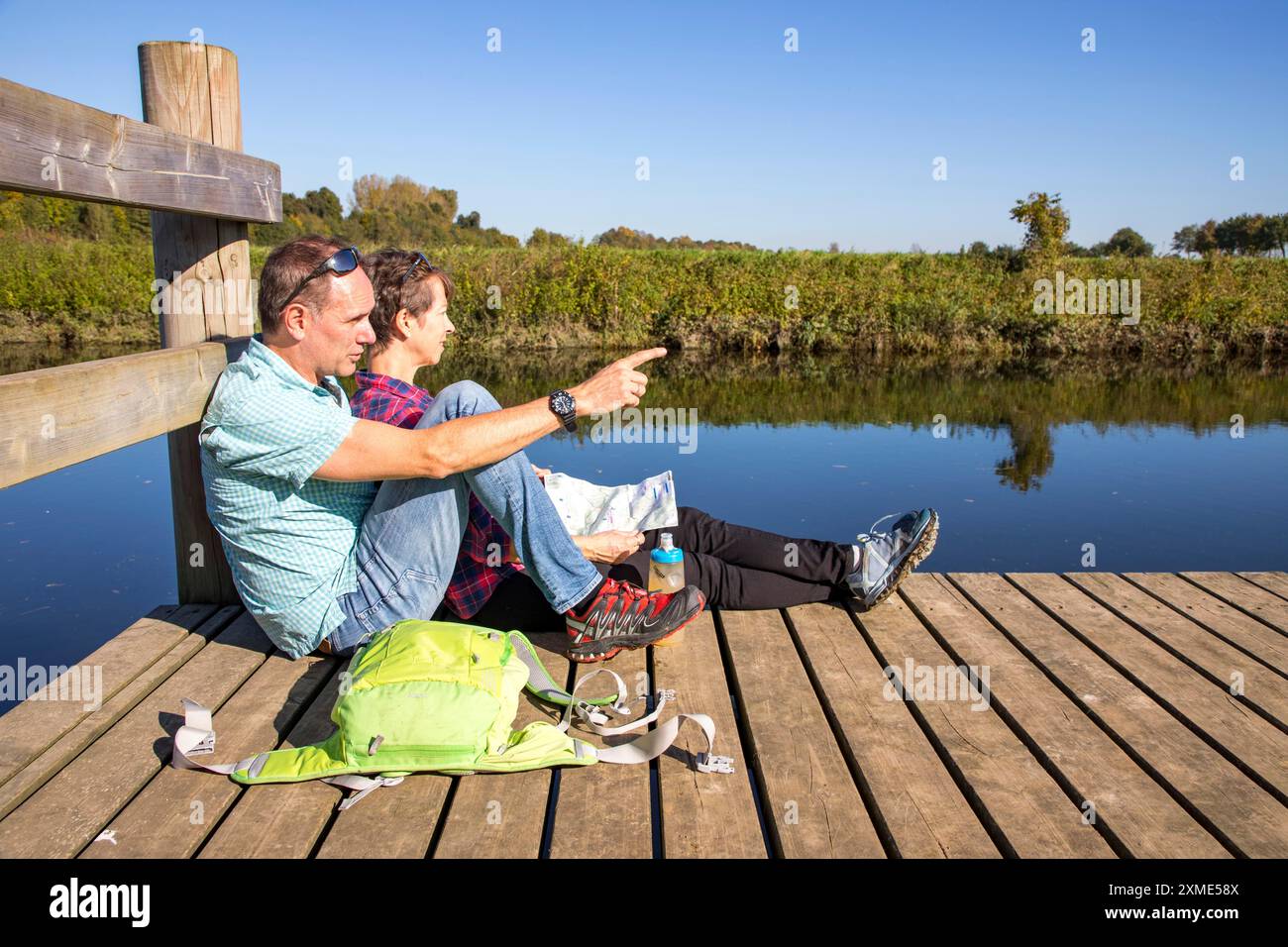 Hikers in the Steverauen Olfen, a renaturalised floodplain landscape ...