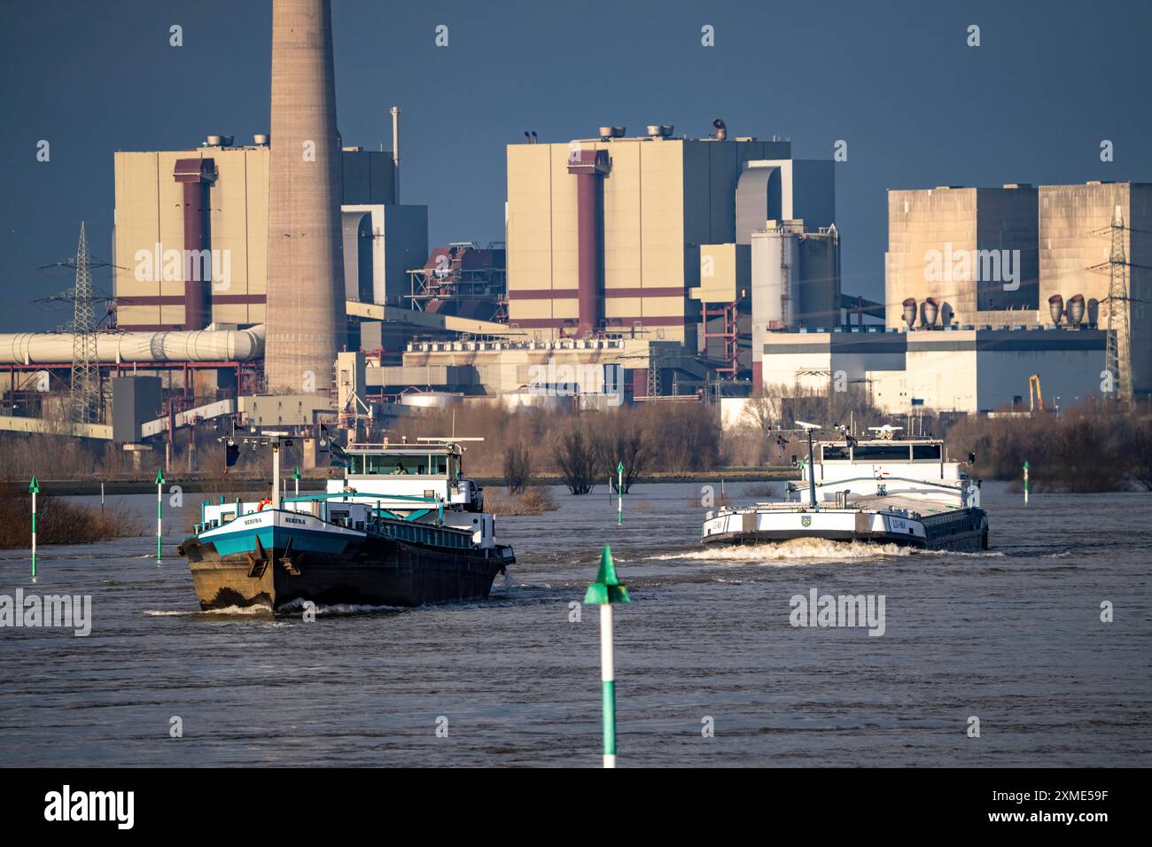 Cargo ships on the Rhine near Rheinberg, in the background the ...