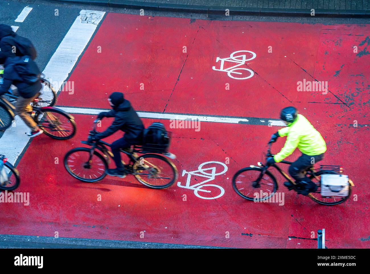 Cycle lane, space for cyclists at a traffic light crossing, marked red ...