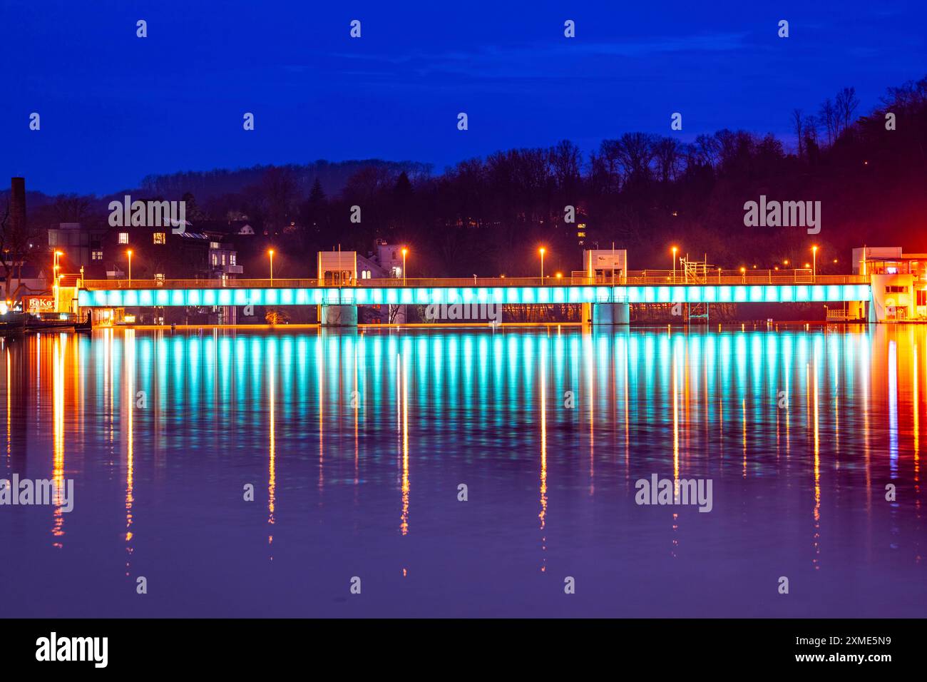 Lake Baldeney, illuminated weir, with lock, left and hydroelectric ...