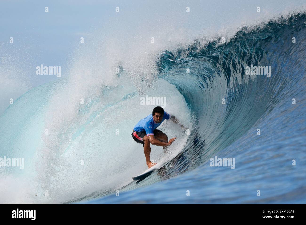 Connor O'Leary, of Japan, surfs during the first round of the 2024 Summer Olympics surfing ...