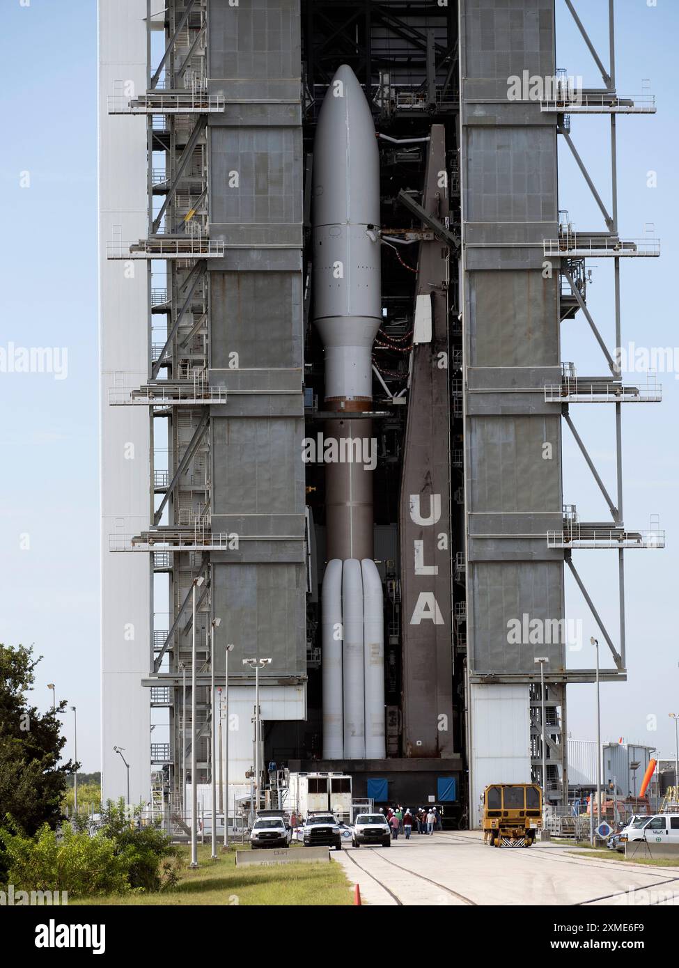 A United Launch Alliance (ULA) Atlas V rocket is prepared to roll out ...