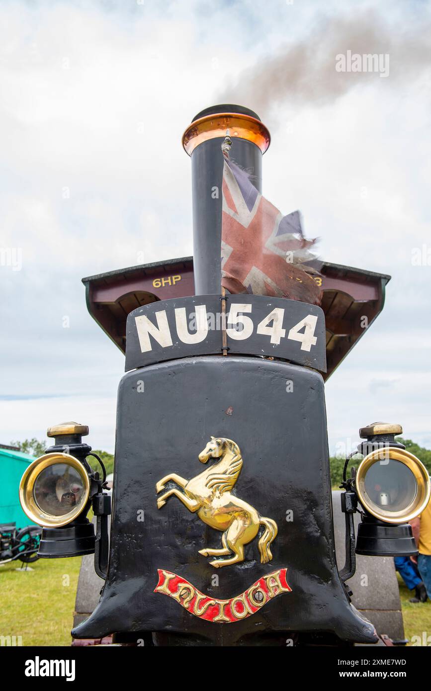 steam traction engine or steam roller with invicta crest badge on the ...