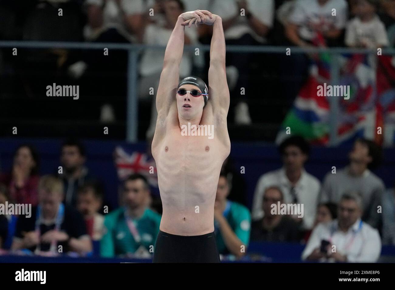 Aaron Shackell, of the United States, stretches ahead of the men's 400 ...