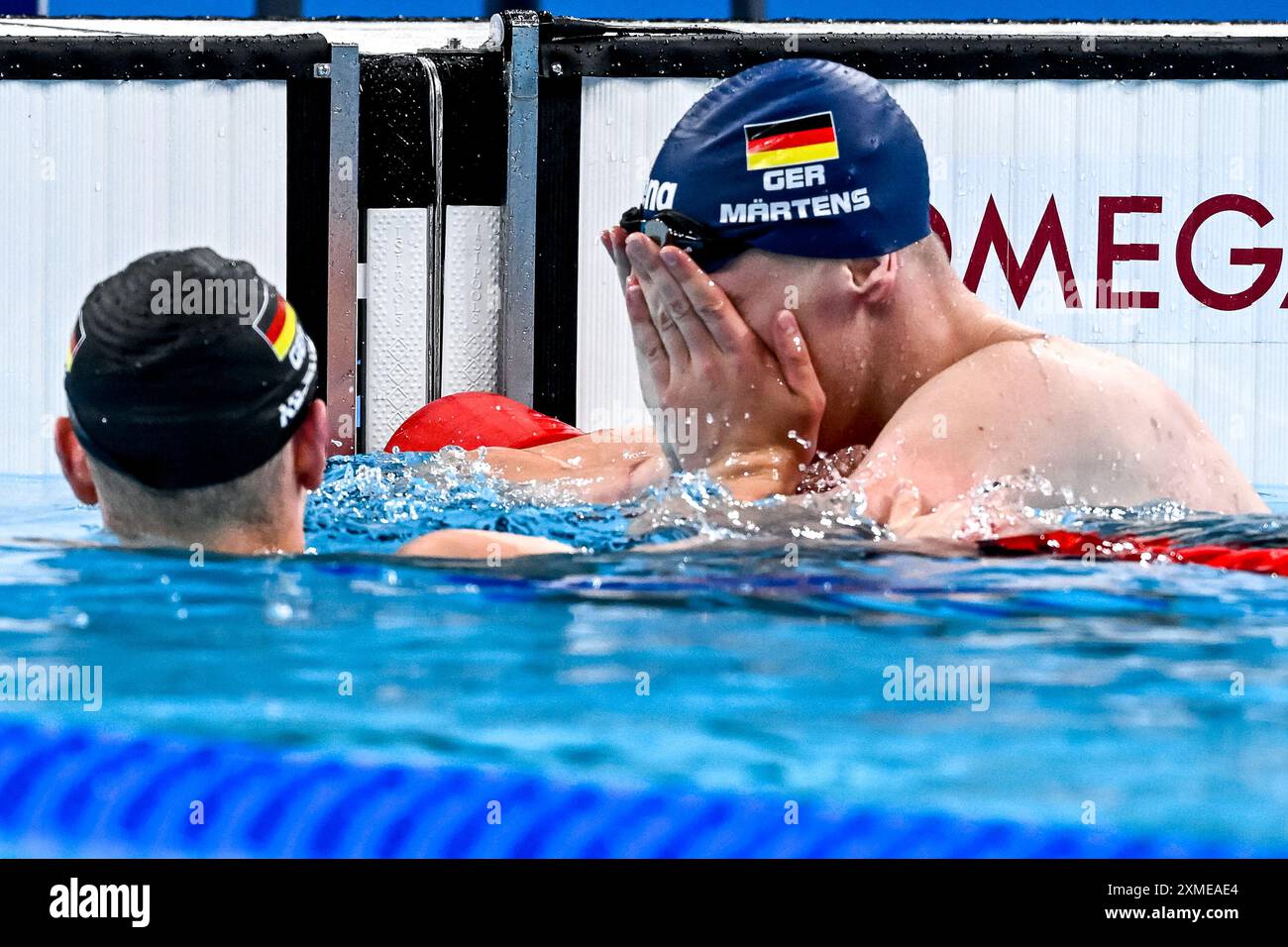 Oliver Klemet and Lukas Martens, gold, of Germany react after competing ...