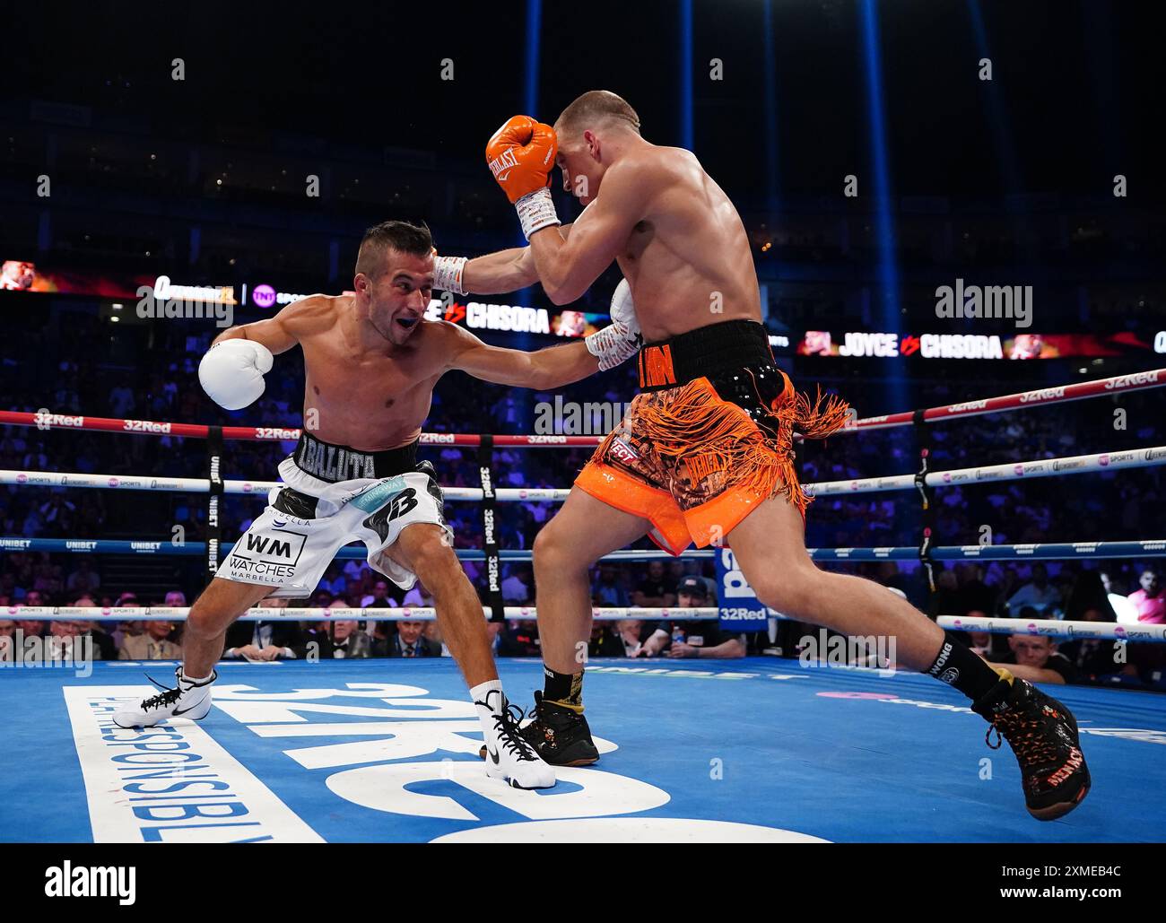 Dennis McCann (right) in action against Ionut Baluta at The O2, London ...
