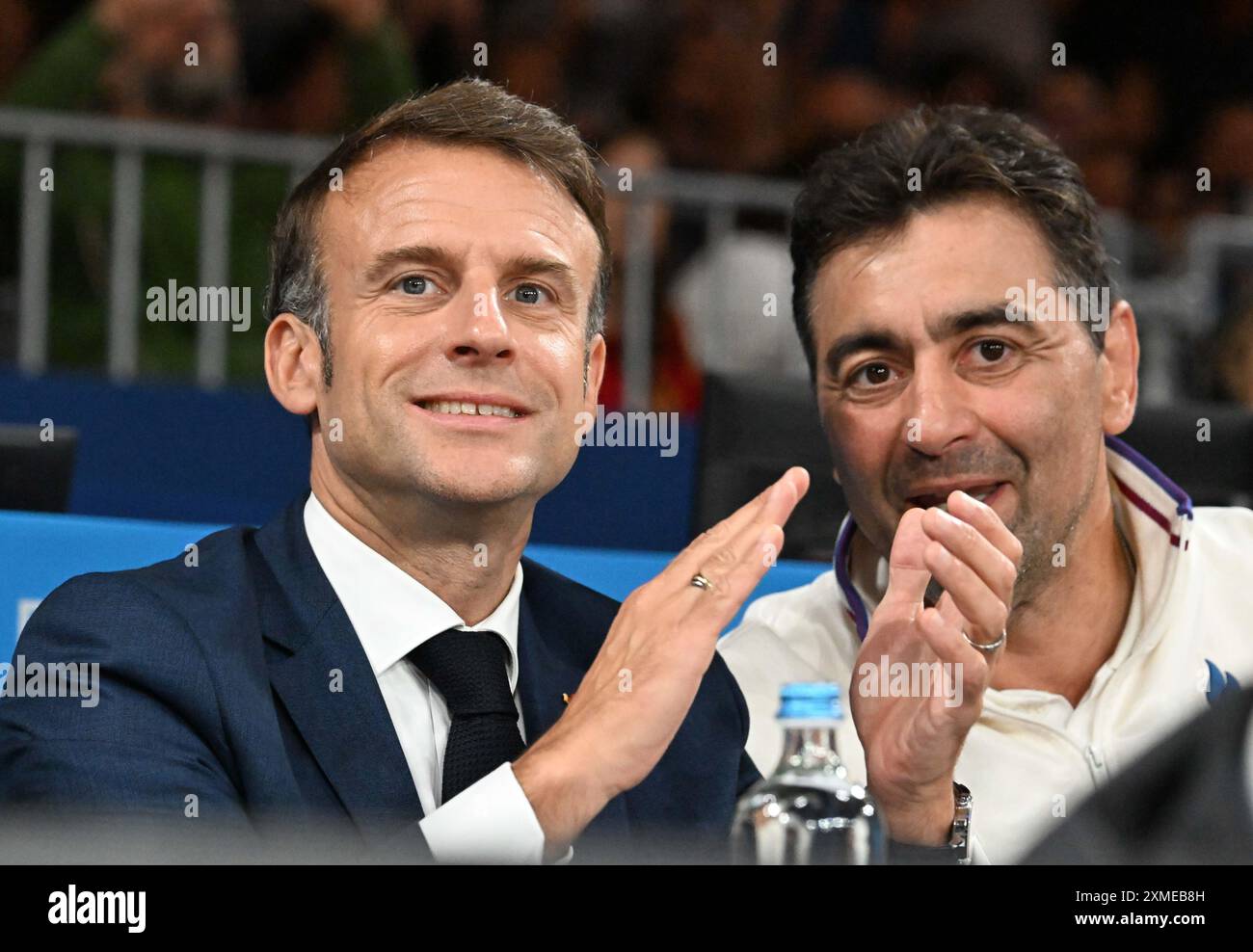 Paris, France. 27th July, 2024. French President Emmanuel Macron (L ...
