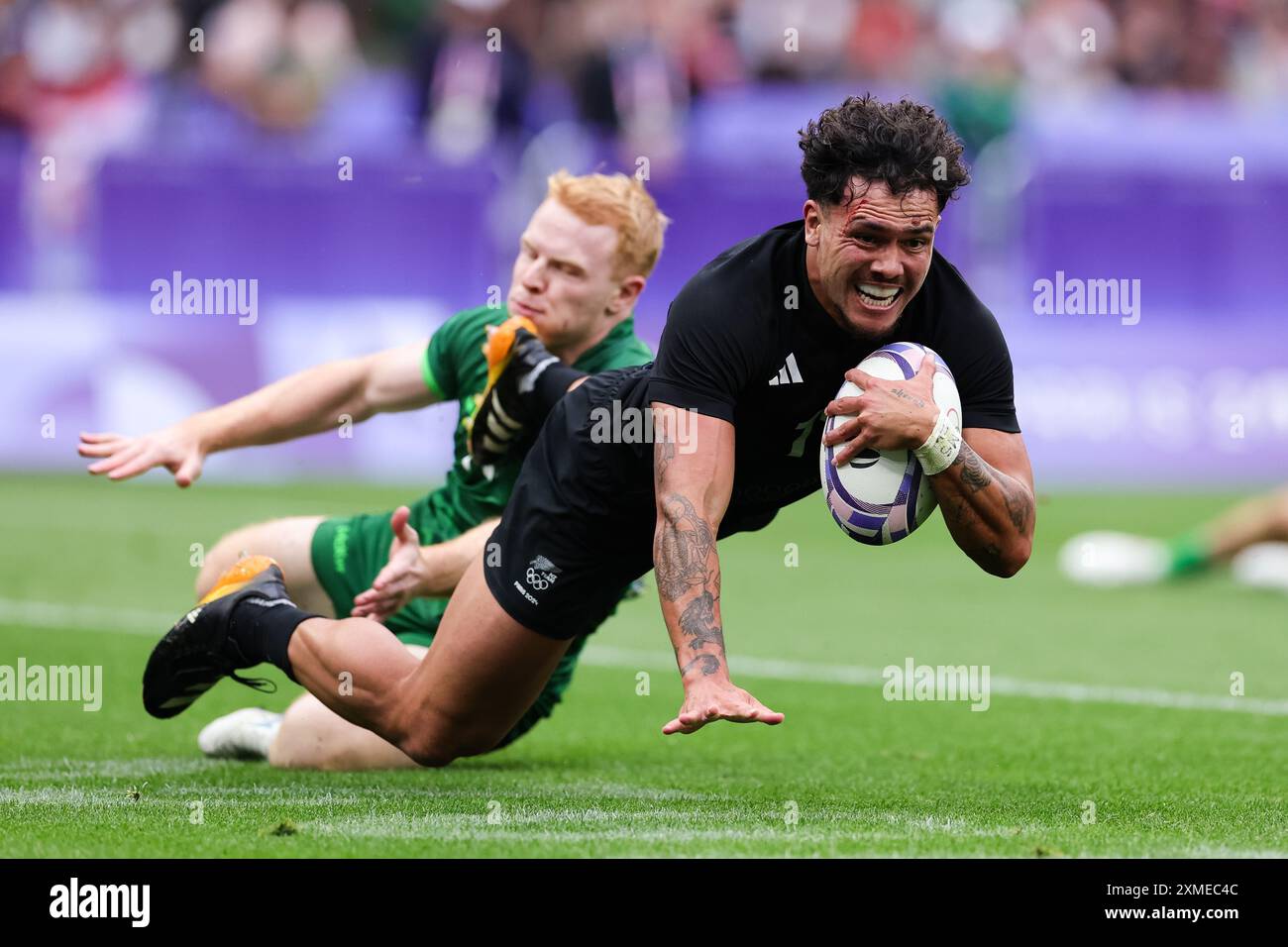 Paris, France, 27 July, 2024. Moses Leo (11) of Team New Zealand runs ...