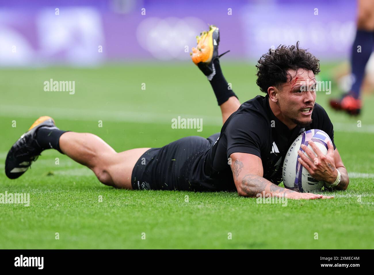 Paris, France, 27 July, 2024. Moses Leo (11) of Team New Zealand runs ...