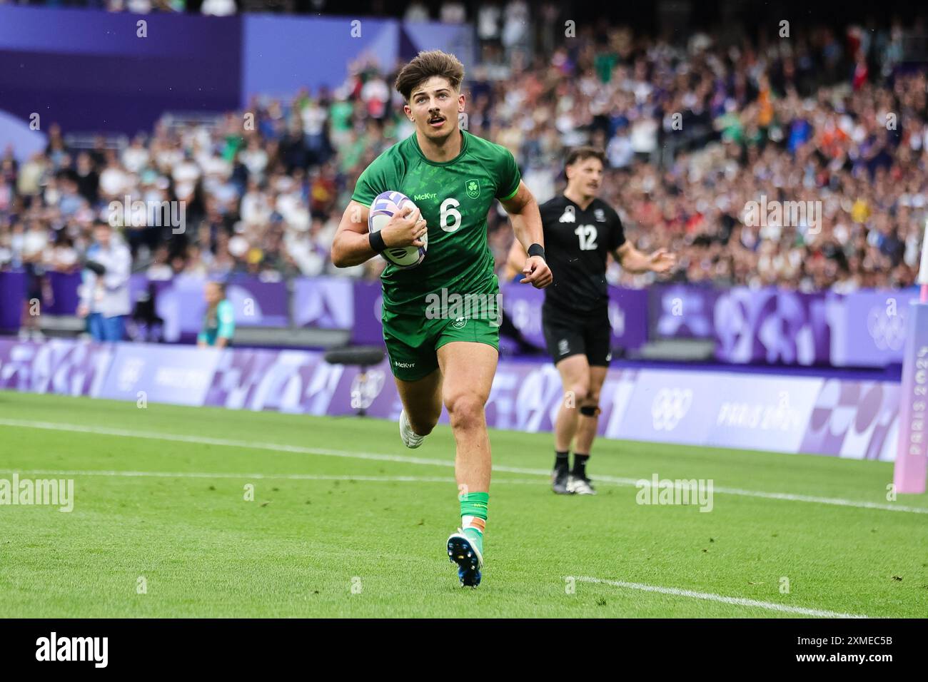 Paris, France, 27 July, 2024. Chay Mullins (6) of Team Ireland runs in ...