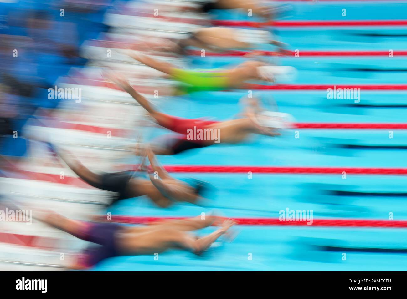Swimmers compete during a heat in the men's 100-meter breaststroke at ...