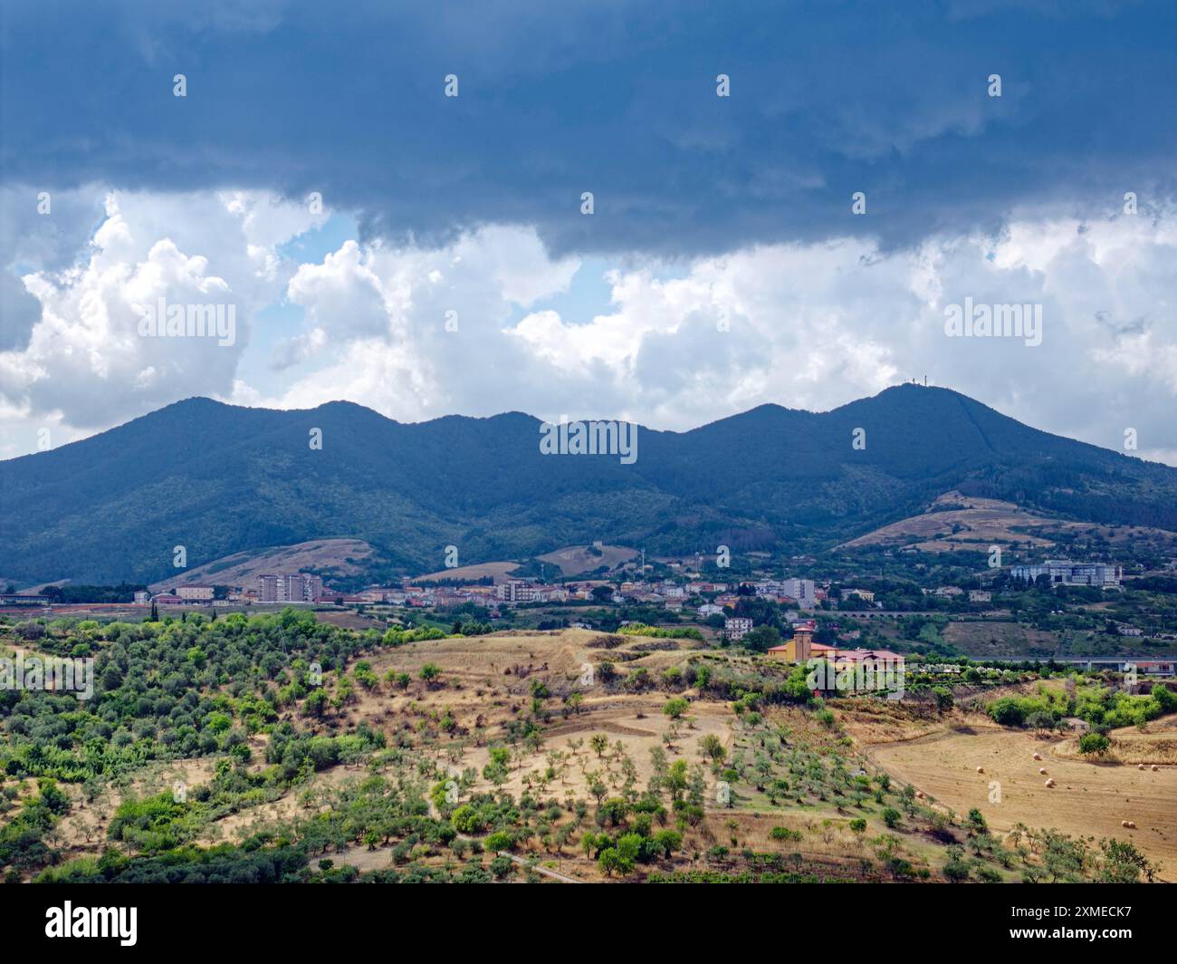 The hilly landscape of Basilicata with the towering Monte Vulture in ...