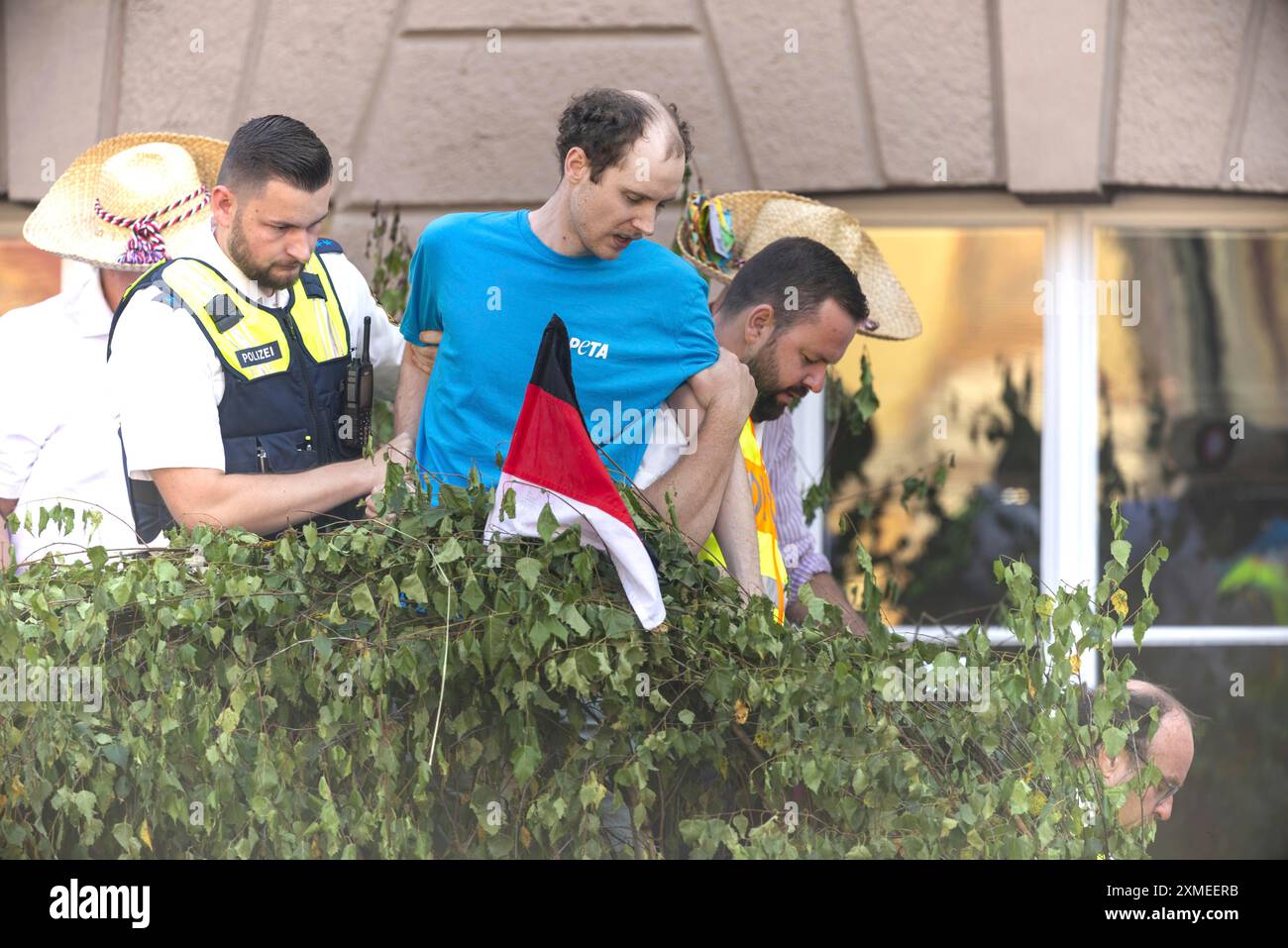 A member of PETA, Germany's largest animal rights organisation, is ...