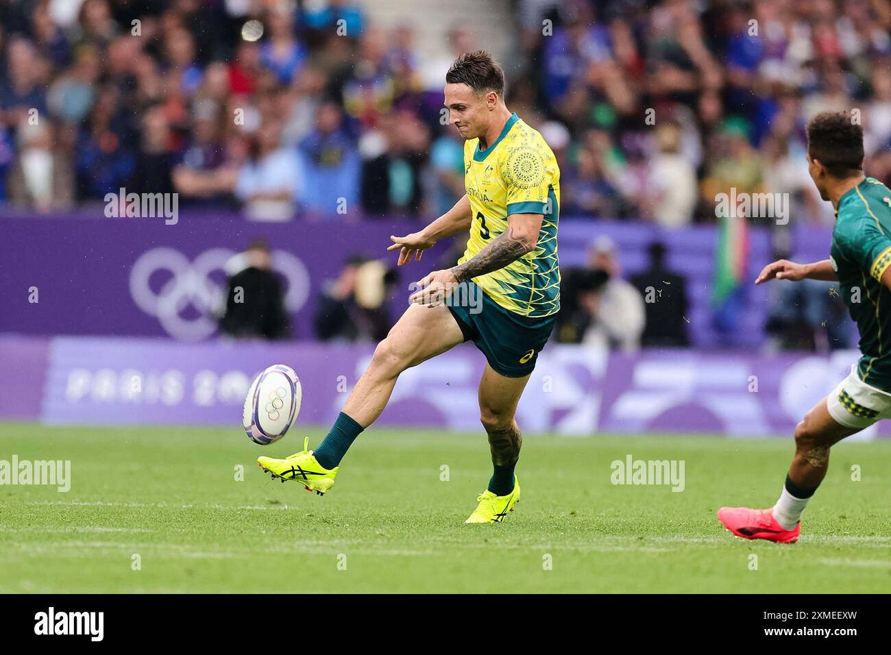 Paris, France, 27 July, 2024. Corey Toole (3) of Team Australia kicks ...