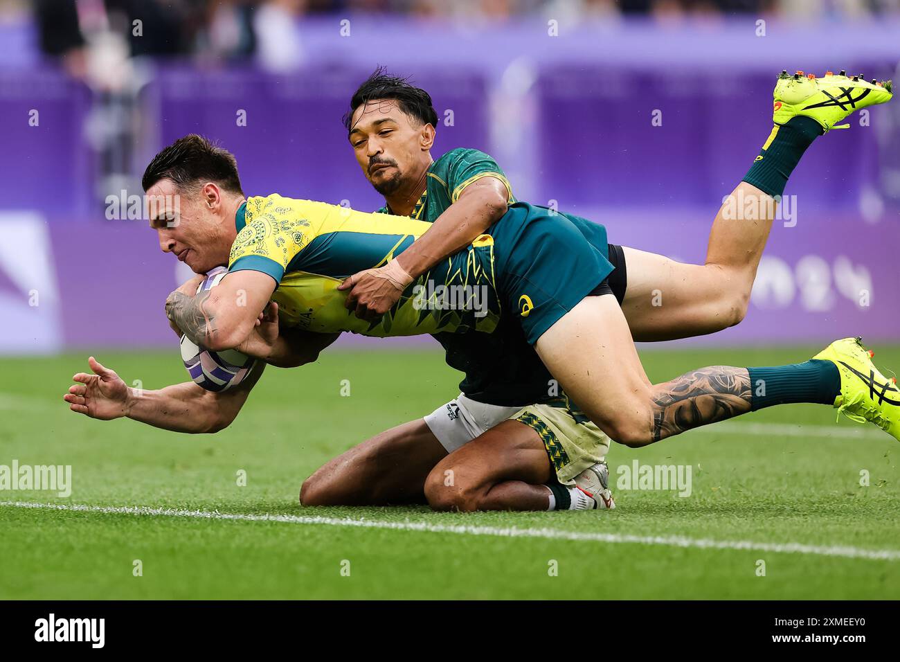 Paris, France, 27 July, 2024. Corey Toole (3) of Team Australia kicks ...