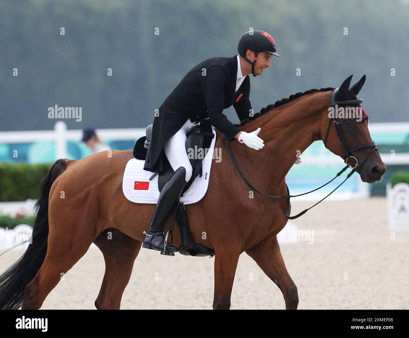 Paris, France. 27th July, 2024. Chinese equestrian athlete Hua Tian ...