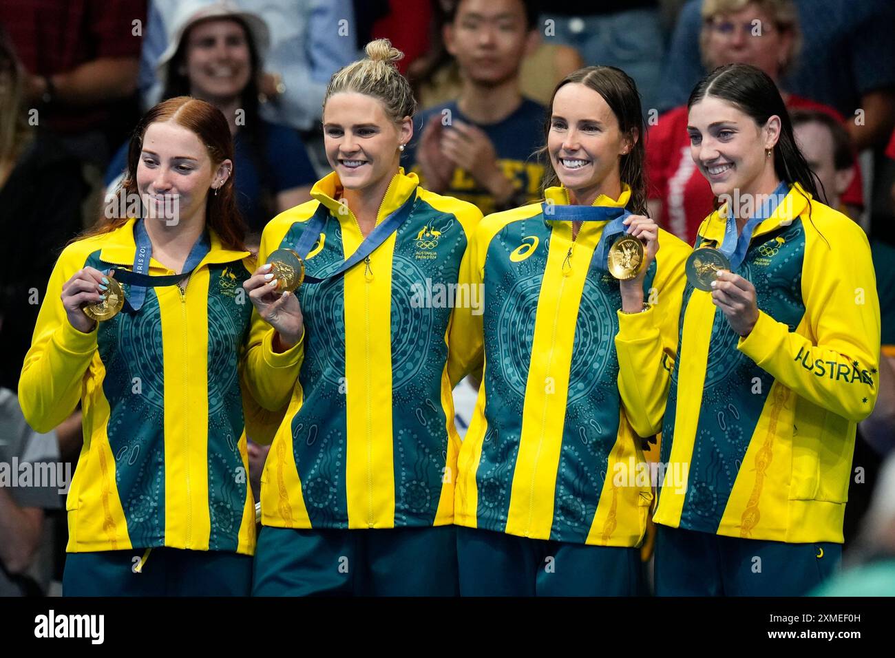 Australia's Mollie O'Callaghan, Shayna Jack, Emma Mckeon and Meg Harris, celebrate on the podium ...