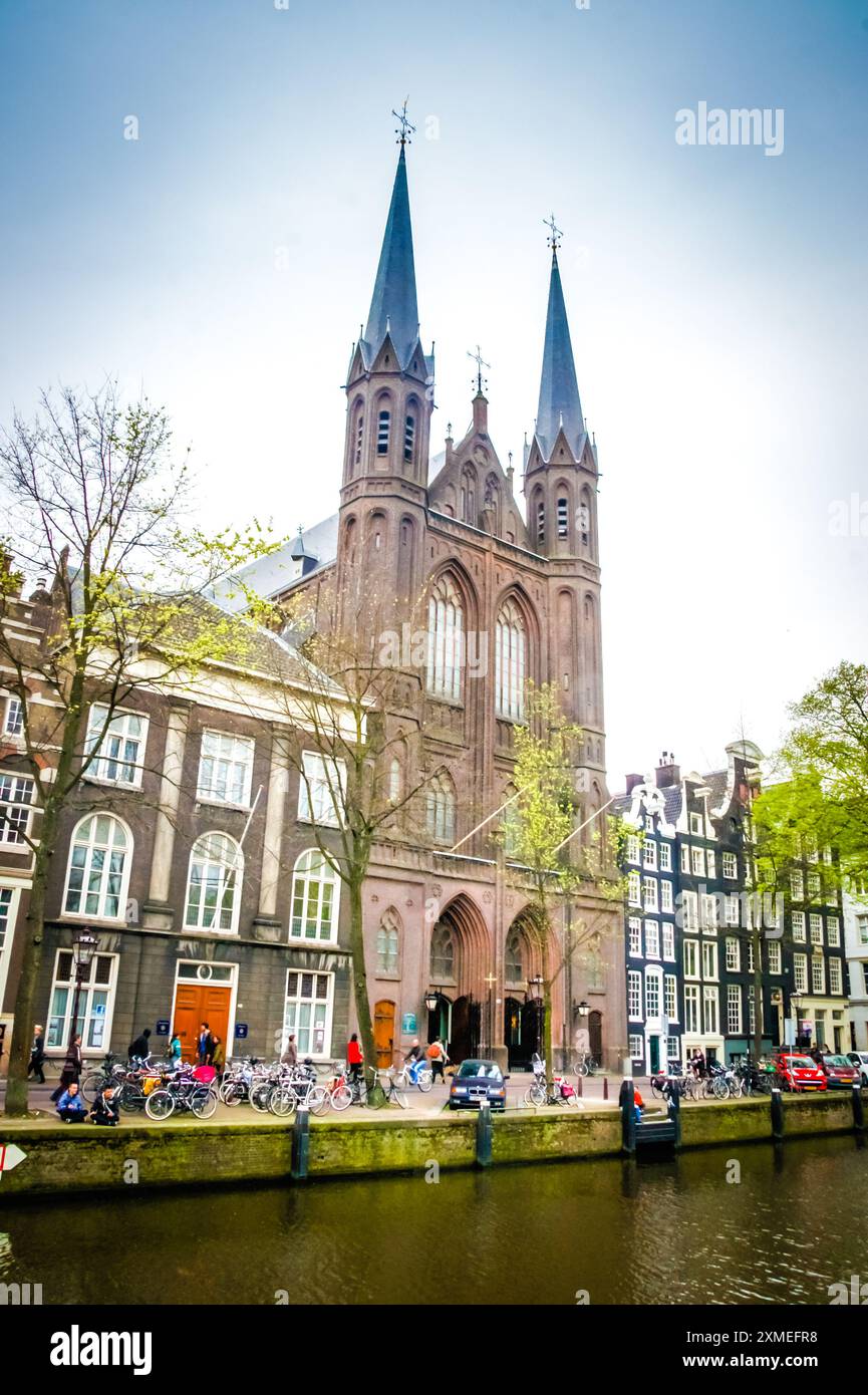A picturesque scene in Amsterdam. The Westerkerk church stands proudly ...
