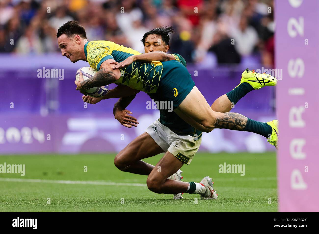 PARIS, FRANCE - JULY 27: Corey Toole (3) of Team Australia kicks ...
