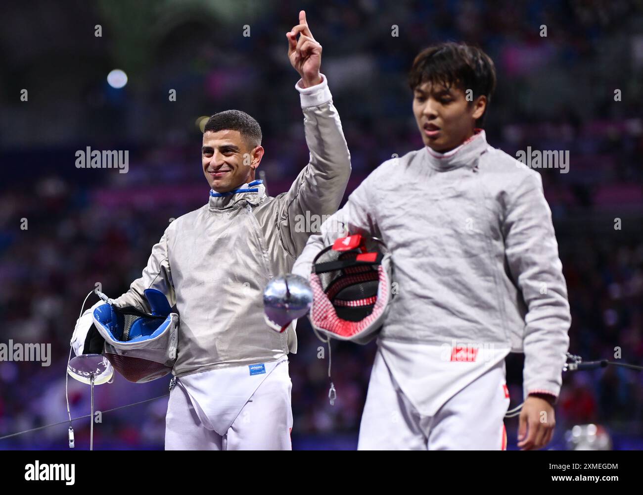 Paris, France. 27th July, 2024. Fares Ferjani (L) of Tunisia celebrates ...